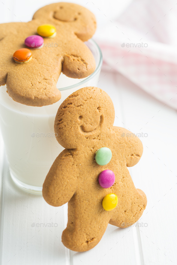 Sweet gingerbread men and glass of milk. Stock Photo by jirkaejc ...