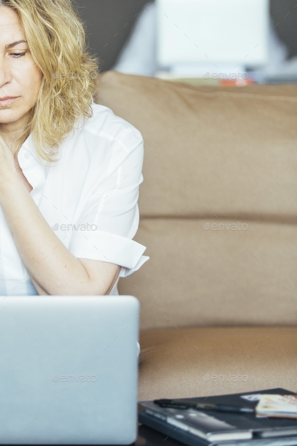 Half face of woman working on laptop Stock Photo by Click_and_Photo