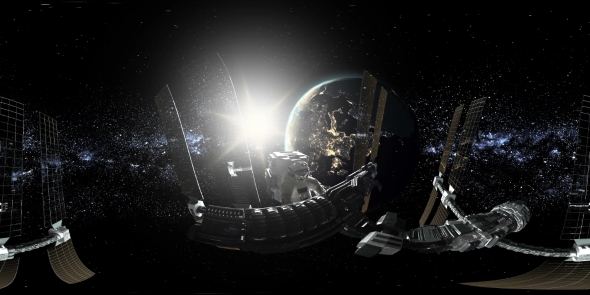 Astronaut and International Space Station Orbiting Earth in Virtual ...