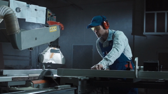 Man Working with Saw in Shop, Stock Footage | VideoHive