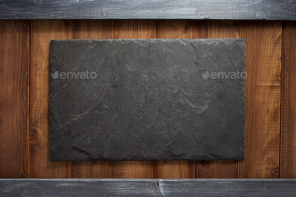slate stone at wooden board background Stock Photo by seregam | PhotoDune