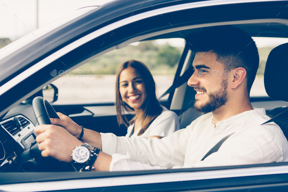 Profile of a happy man driving a car Stock Photo by Click_and_Photo