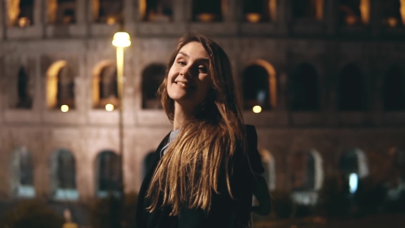 Young Beautiful Woman Standing Near the Colosseum in Rome, Italy, Looks ...