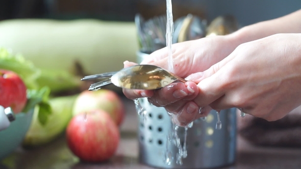 Woman Washing Cutlery in the Sink in the Kitchen, Stock Footage | VideoHive