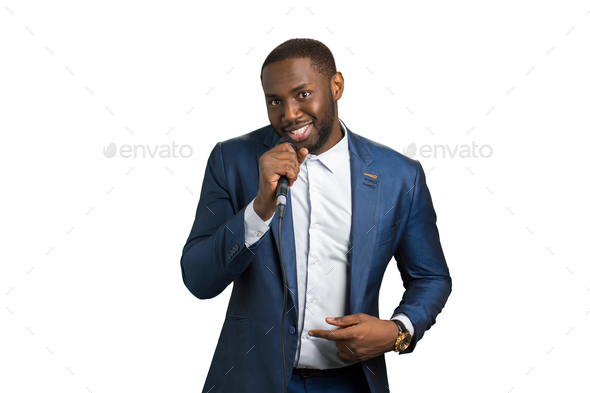 Smiling black man hold microphone Stock Photo by stockfilmstudio ...