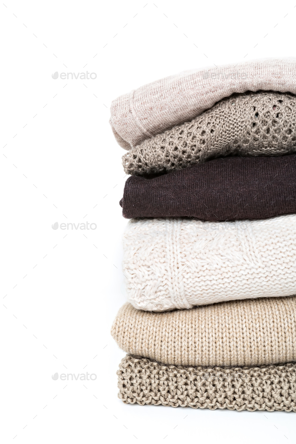 Stack of sweaters Stock Photo by fotyma | PhotoDune