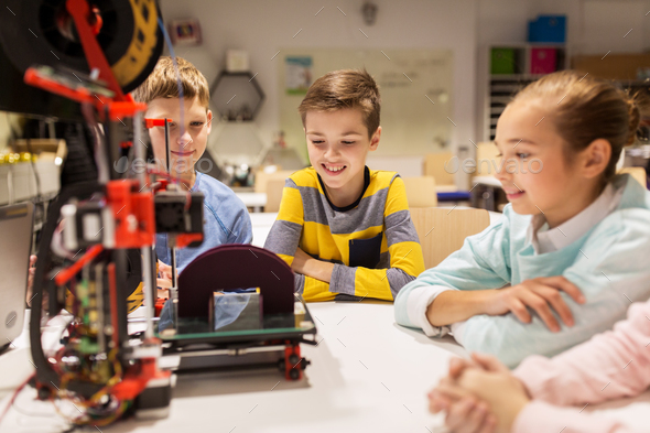 happy children with 3d printer at robotics school Stock Photo by dolgachov