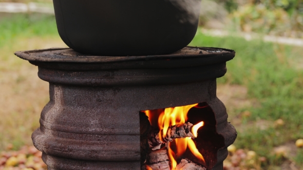 Cooking Outdoors in Cast-iron Cauldron, Stock Footage | VideoHive