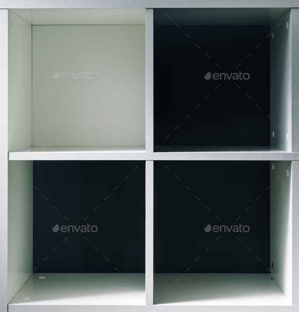 Empty office or bookcase library shelves Stock Photo by stevanovicigor