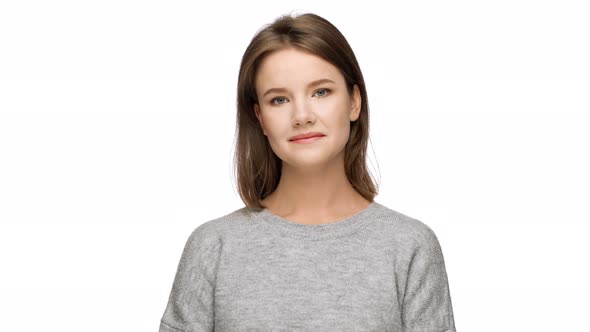 Portrait of Affable Brunette Lady Expressing Agreement While Nodding ...