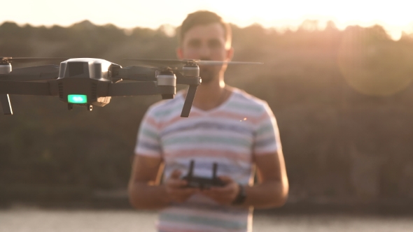 Man Controlling Drone with Rc., Stock Footage | VideoHive