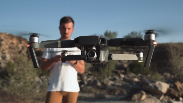 Man Controlling Drone with Rc., Stock Footage | VideoHive