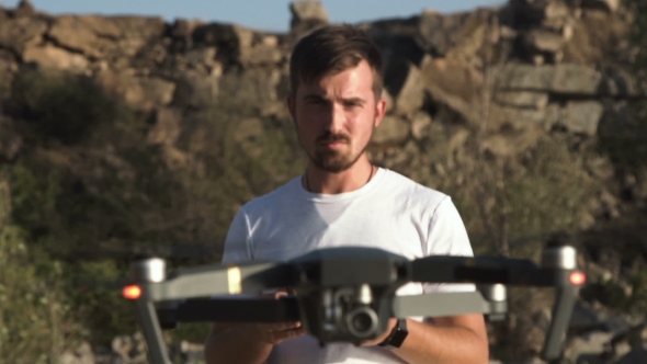 Man Controlling Drone with Rc., Stock Footage | VideoHive