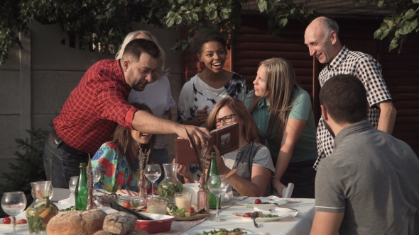 Family Watching Photos Together, Stock Footage | VideoHive