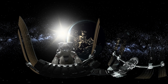 Astronaut and International Space Station Orbiting Earth in Virtual ...