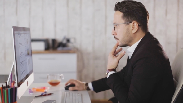 Serious Man Working at Office, Stock Footage | VideoHive