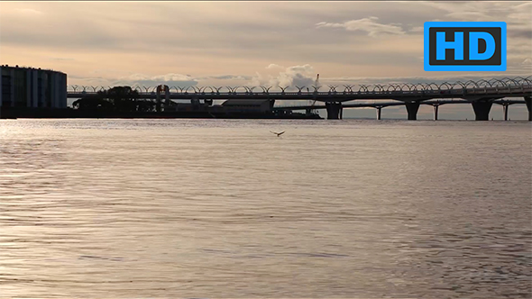 Calm Wavy Surface Bridges Across the Pond with Running Cars Shoreline ...
