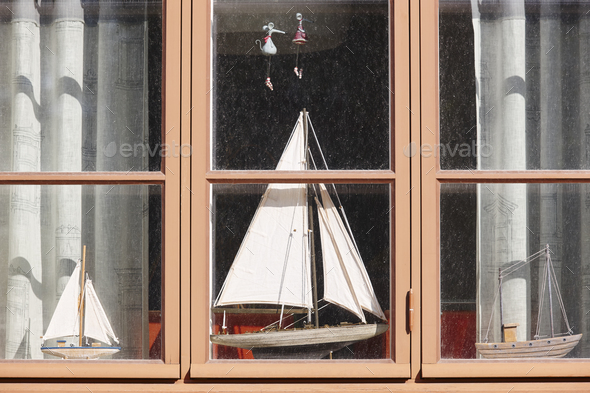 Traditional wooden window with model boats. Vintage background ...