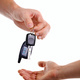 Male hand handing over key to another person Stock Photo by photobac