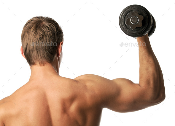 Muscular young man lifting a dumbbell, rear view Stock Photo by photobac