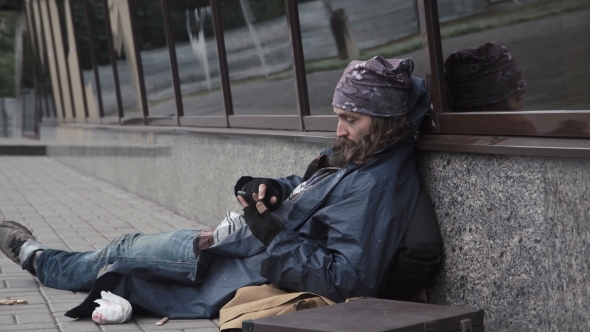 Homeless Using Smartphone, Stock Footage | VideoHive
