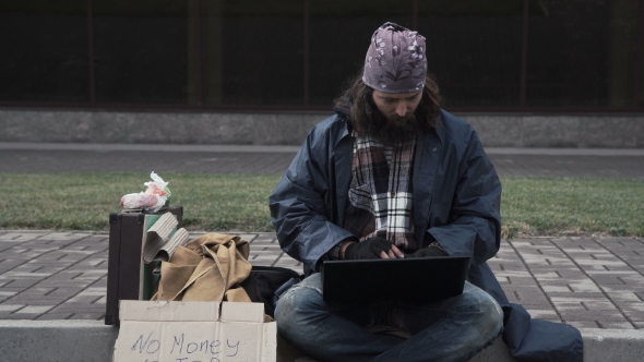 Poor Man Typing on Laptop, Stock Footage | VideoHive
