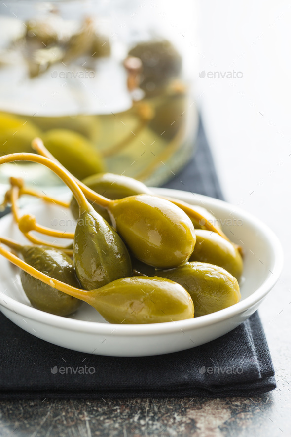 Pickled caper berries. Stock Photo by jirkaejc | PhotoDune