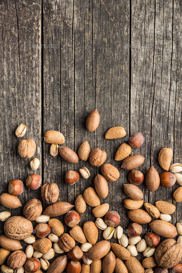 Different types of nuts in the nutshell. Stock Photo by jirkaejc ...