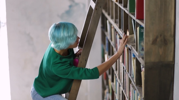 Girl Standing on Ladder Searching Book in Library, Stock Footage ...