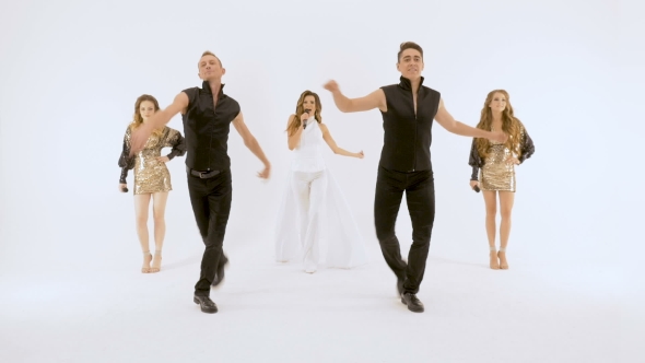 A Group of Professional Actors Dancing on a White Background. They Move ...