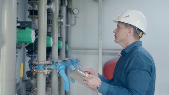 Engineer Inspects the Gas Boiler, Stock Footage | VideoHive