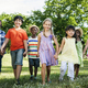 Group of diverse kids having fun together in the park Stock Photo by ...