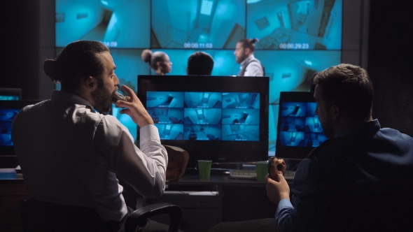 Security Guards Watching the Surveillance Cameras, Stock Footage ...