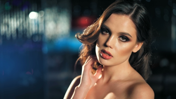 Beautiful Glamour Woman in Fashionable Dress Posing Over Blue and Red ...