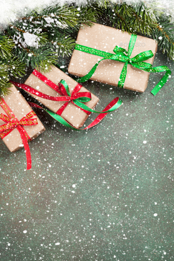 Christmas gift boxes and snow tree Stock Photo by karandaev | PhotoDune
