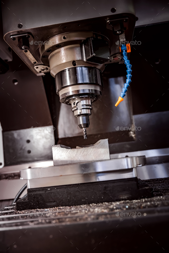 Metalworking CNC milling machine. Stock Photo by cookelma | PhotoDune