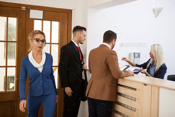 Business people in the reception are of an office building Stock Photo ...