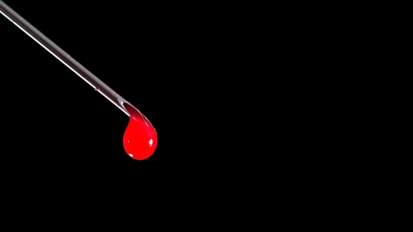 Drop of Blood Falling From Syringe on Black Background, Stock Footage