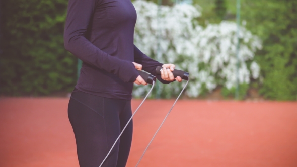 of Hands an Jumping Women on the Jump Rope. Outdoor Sports, Stock Footage