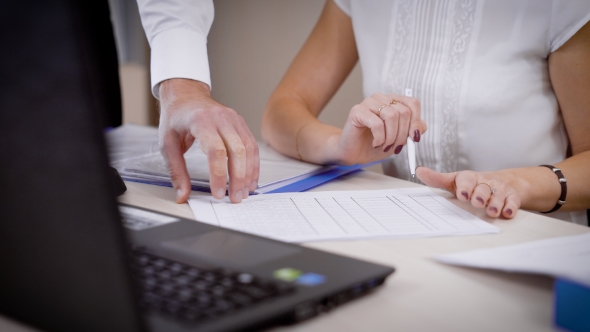 A Woman Shows the Changes in the Legal Documents for Her Boss, the Men ...