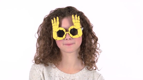 Child Girl Dancing in Funny Glasses. White Background, Stock Footage