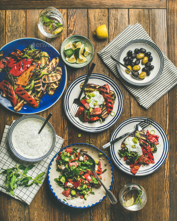 Flat-lay of healthy dinner table setting with snacks Stock Photo by ...