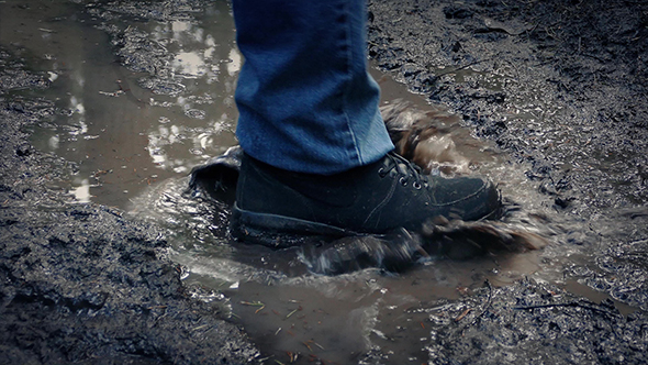 Foot Splashes Muddy Puddle, Stock Footage | VideoHive