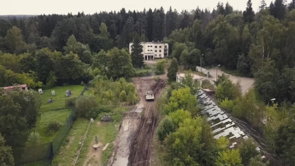Military Vehicle During Training Driving on Shooting Range View From ...