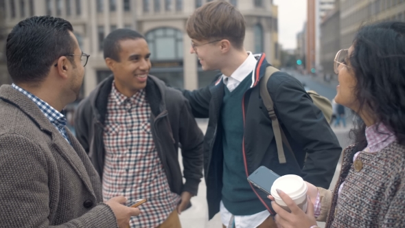 A Group of Young People of Different Nationalities Cheerfully ...