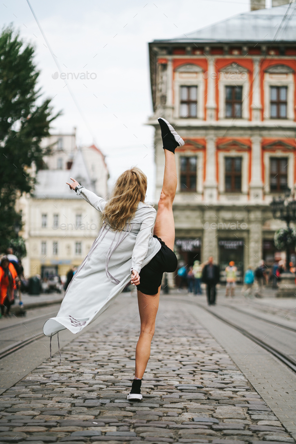 beautiful young girl lifted her leg up Stock Photo by simbiothy | PhotoDune