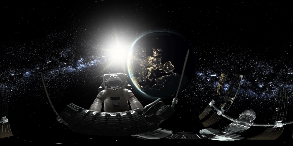 Astronaut and International Space Station Orbiting Earth in Virtual ...