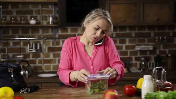 Busy Woman in the Kitchen Getting Ready for Work, Stock Footage | VideoHive