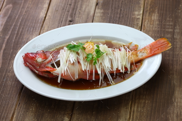 chinese steamed red grouper with ginger, scallions and soy sauce Stock ...