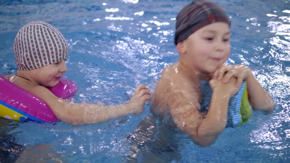 Little Kids Bathe in the Swimming Pool, Stock Footage | VideoHive